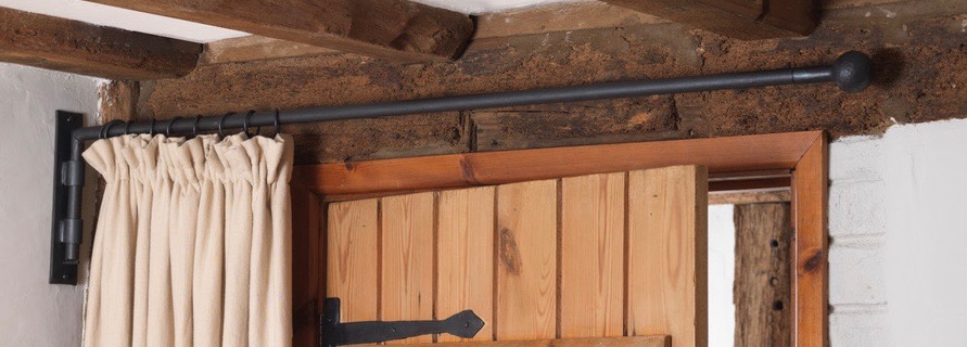 Dressing Doors - Portière Rods - Made by the Forge Blog